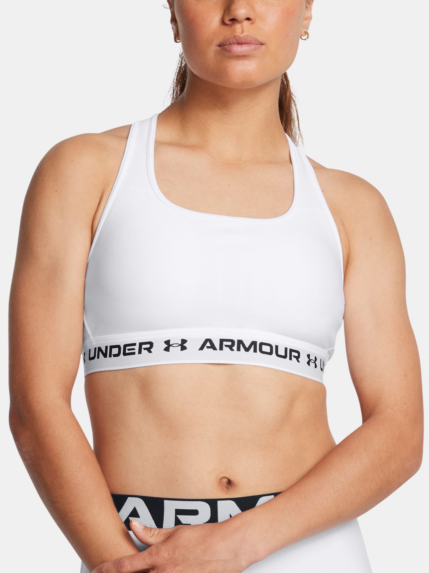 Ženski nedrček Under Armour Crossback Mid Bra | underarmour.si